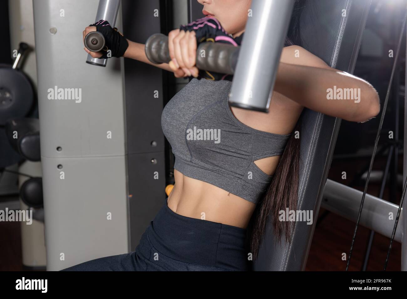 Beautiful Fitness Women Exercising At the Gym Stock Photo - Alamy