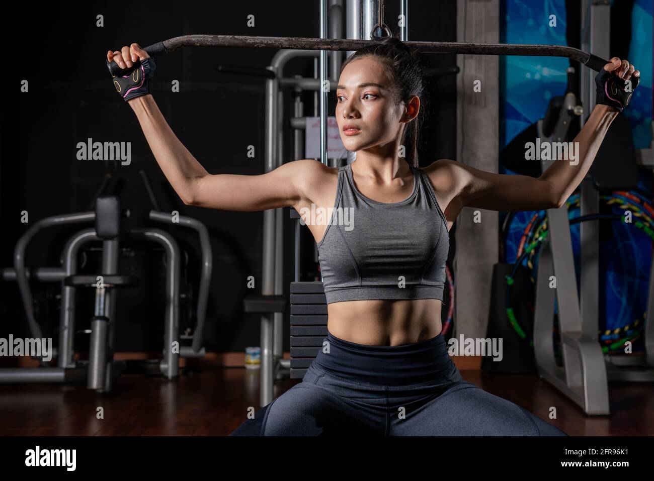 Beautiful Fitness Women Exercising At the Gym Stock Photo - Alamy