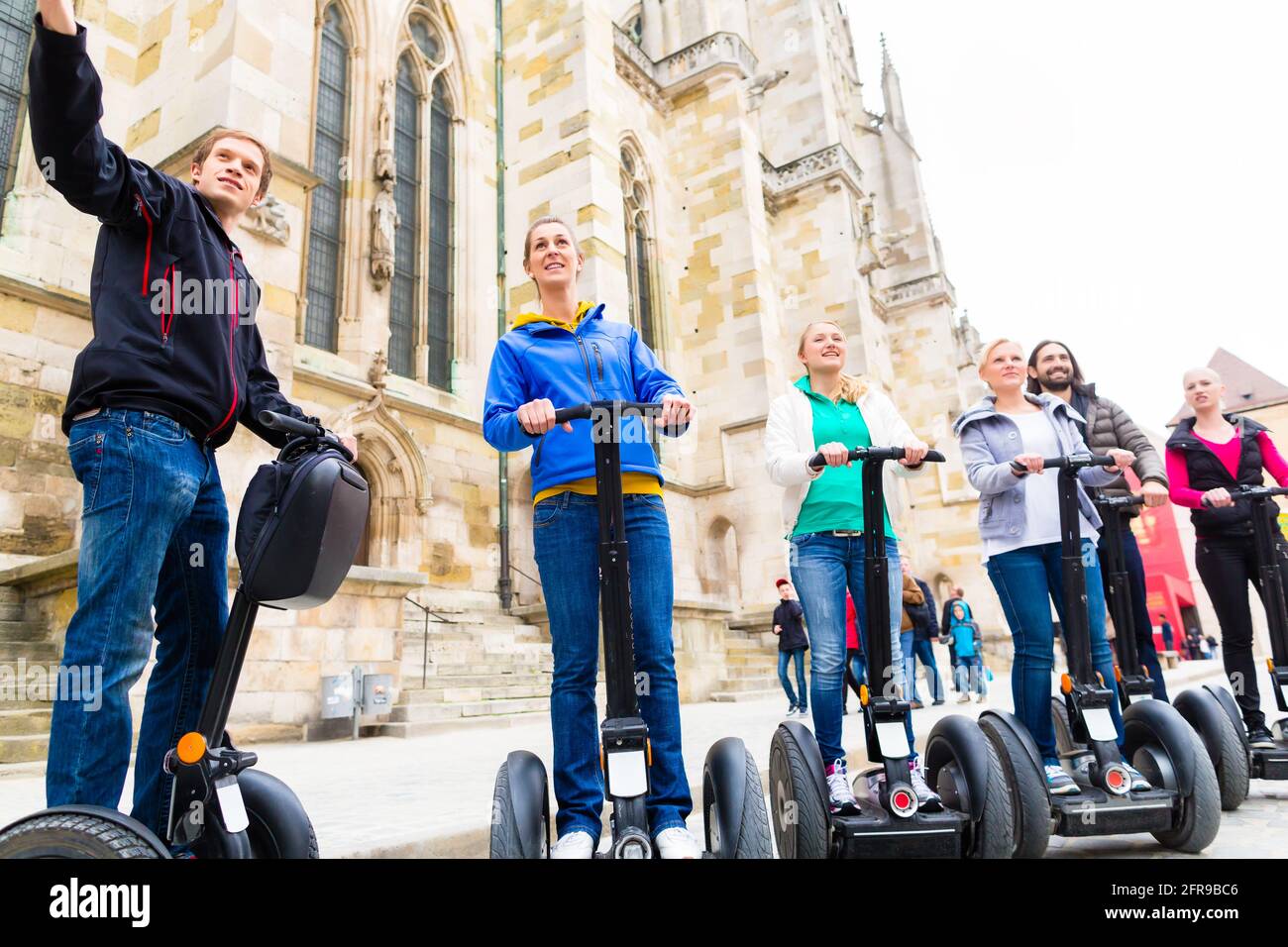 Tourist group having guided Segway city tour in Germany Stock Photo - Alamy