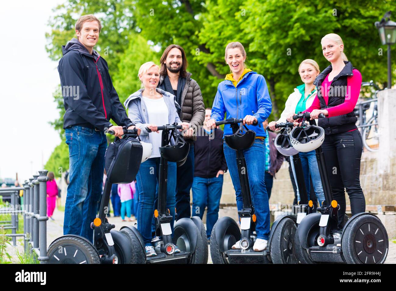 Tourist group having guided Segway city tour in Germany Stock Photo - Alamy