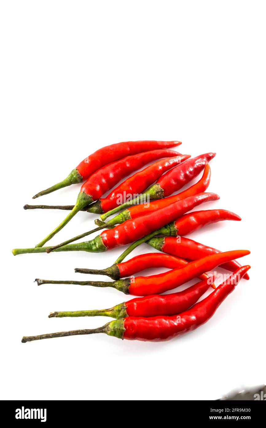 Fresh red juicy peppers isolated on white background Stock Photo - Alamy