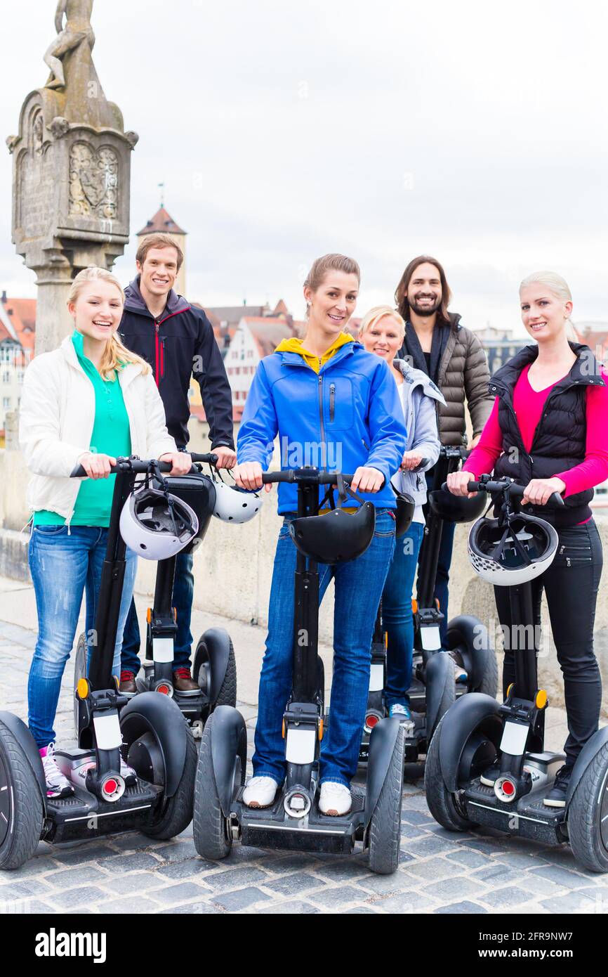 Tourist group having guided Segway city tour in Germany Stock Photo - Alamy