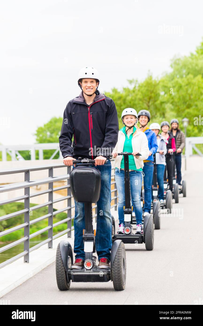 Tourist group having guided Segway city tour in Germany Stock Photo - Alamy