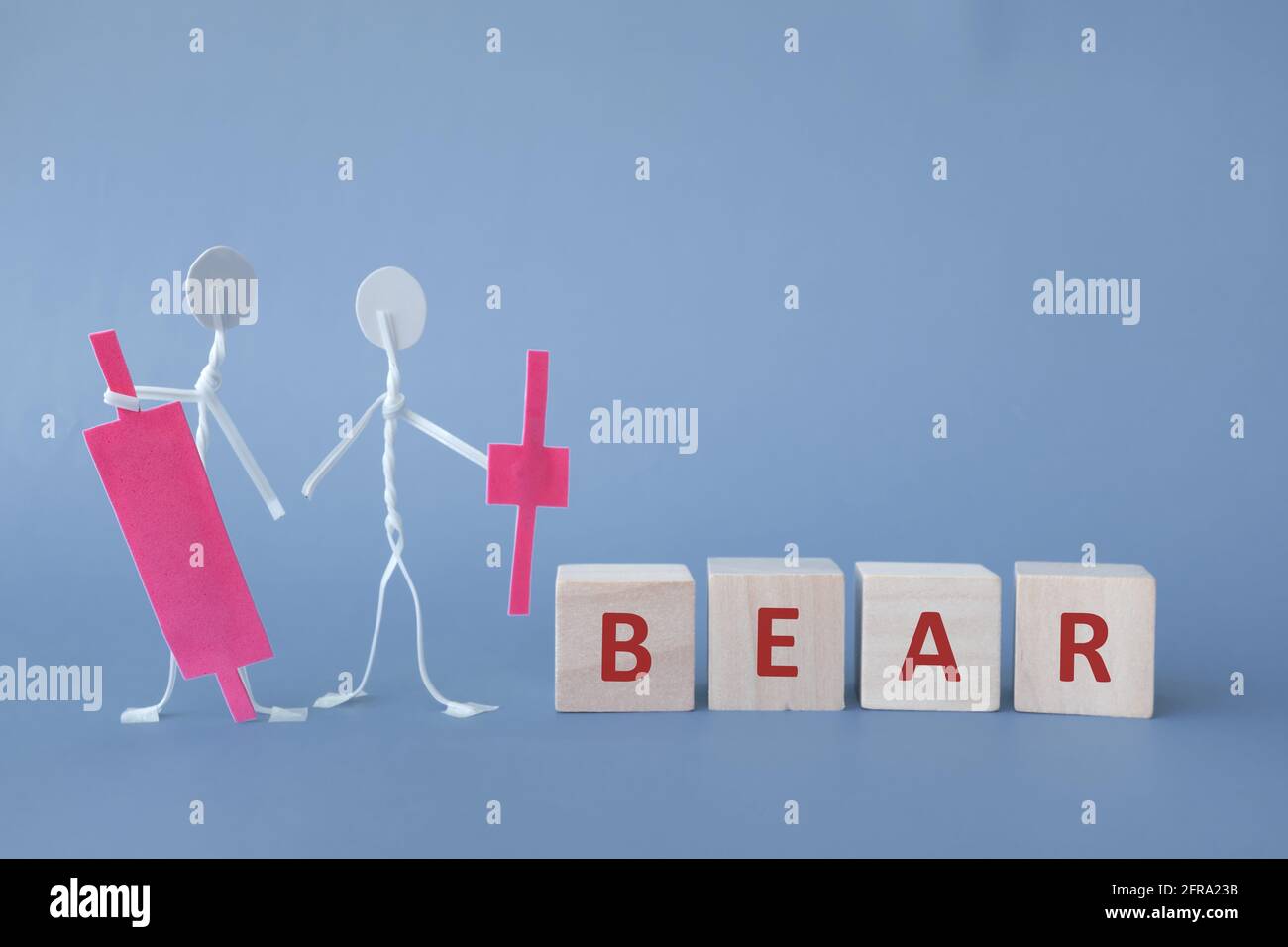 Human stick figure holding red candlestick pattern in dark blue ...