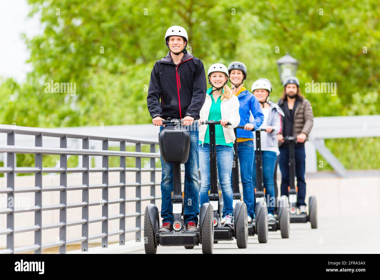 Tourist group having guided Segway city tour in Germany Stock Photo - Alamy