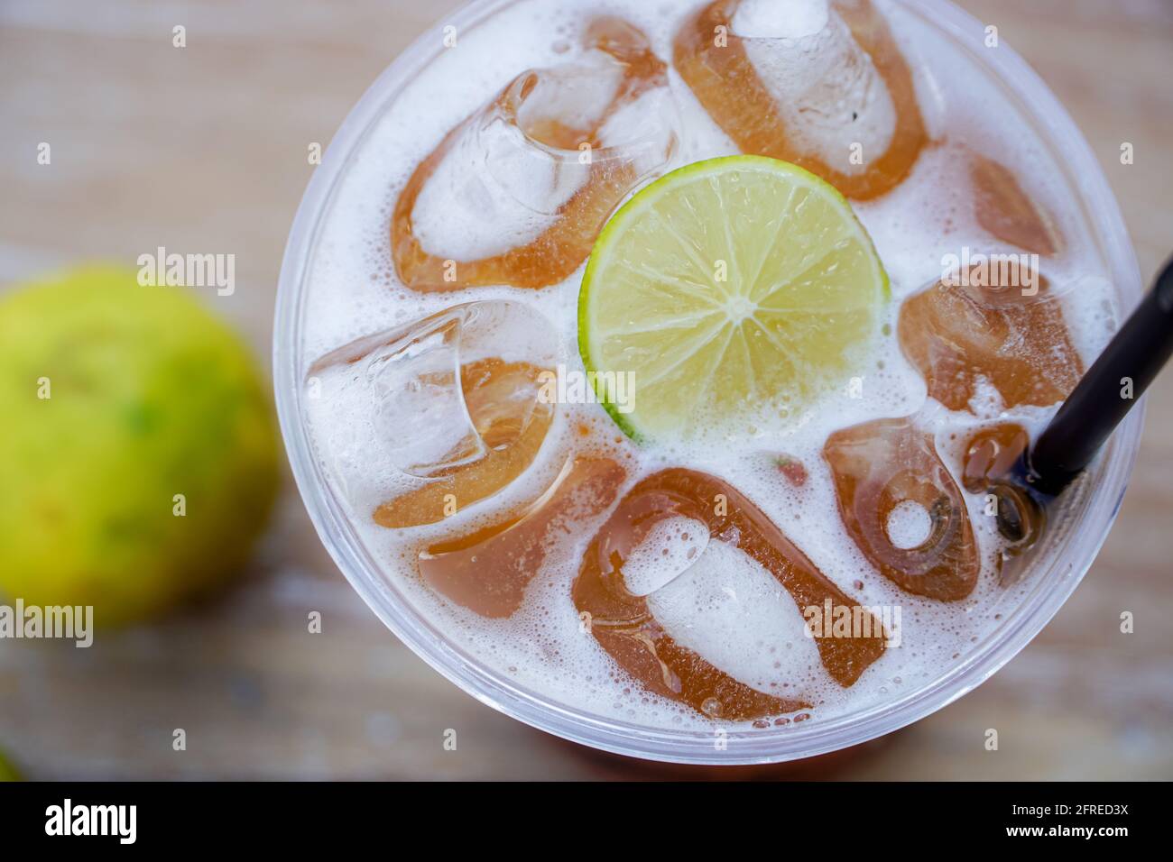 A cup of refreshing iced lemon tea photographed from above Stock Photo ...