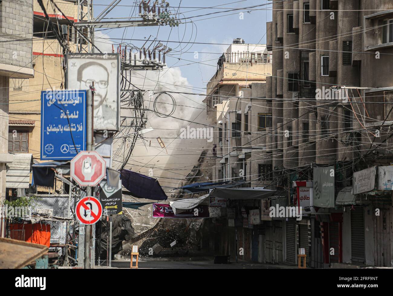 Gaza, Palestine. 20th May, 2021. A cloud of smoke is seen rising over ...
