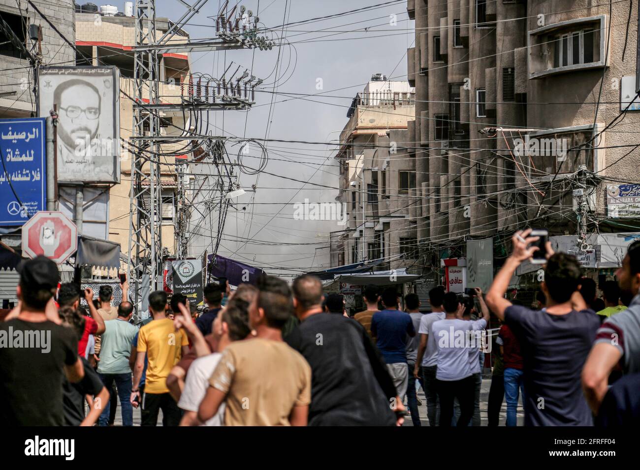 Gaza, Palestine. 20th May, 2021. A cloud of smoke is seen rising over ...