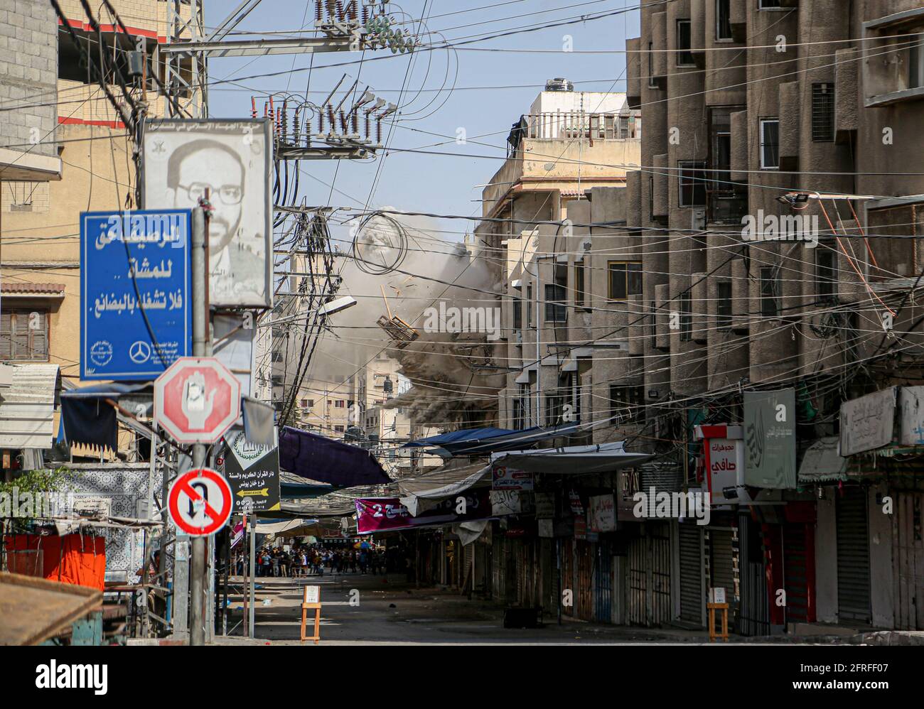 Gaza, Palestine. 20th May, 2021. A cloud of smoke is seen rising over ...