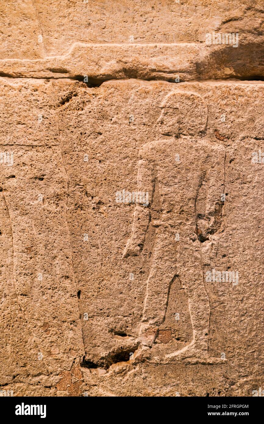 sandstone wall remains with human figure relief from Ancient Egypt ...