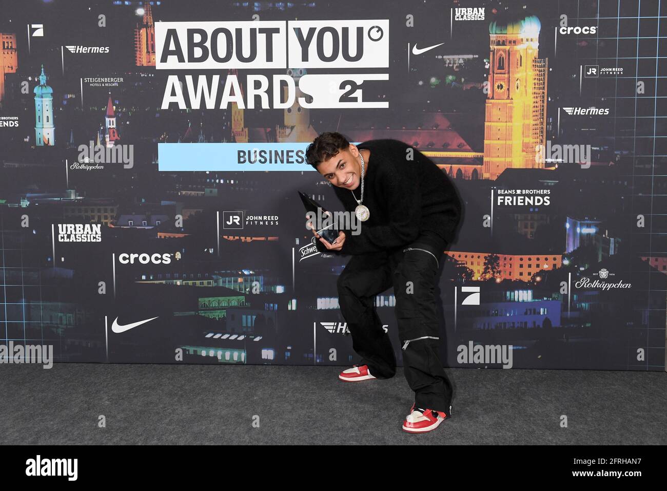 Munich, Germany. 20th May, 2021. Achraf Ait Bouzalim shows off the ...