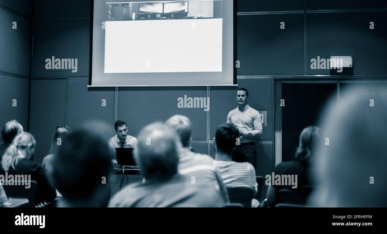 Business speaker giving talk at business conference event Stock Photo ...