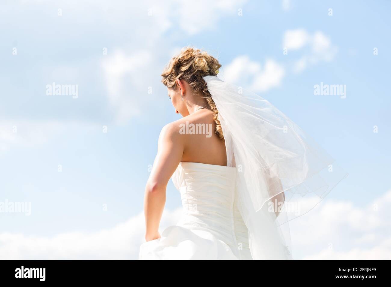 Wedding bride with outside at garden Stock Photo - Alamy