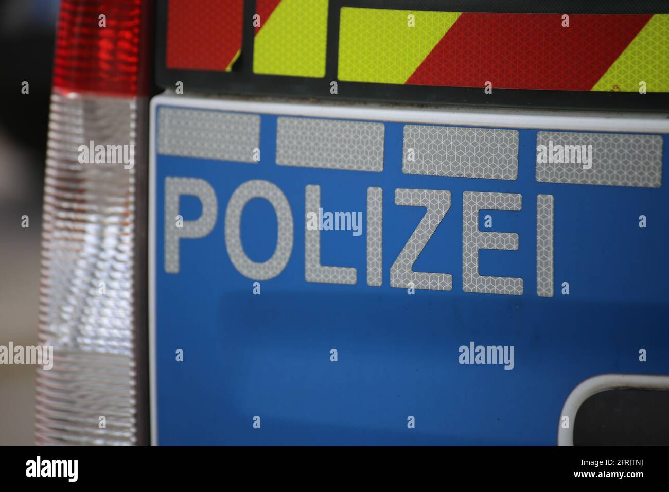 Symbolic image of police action: close-up of an emergency vehicle ...