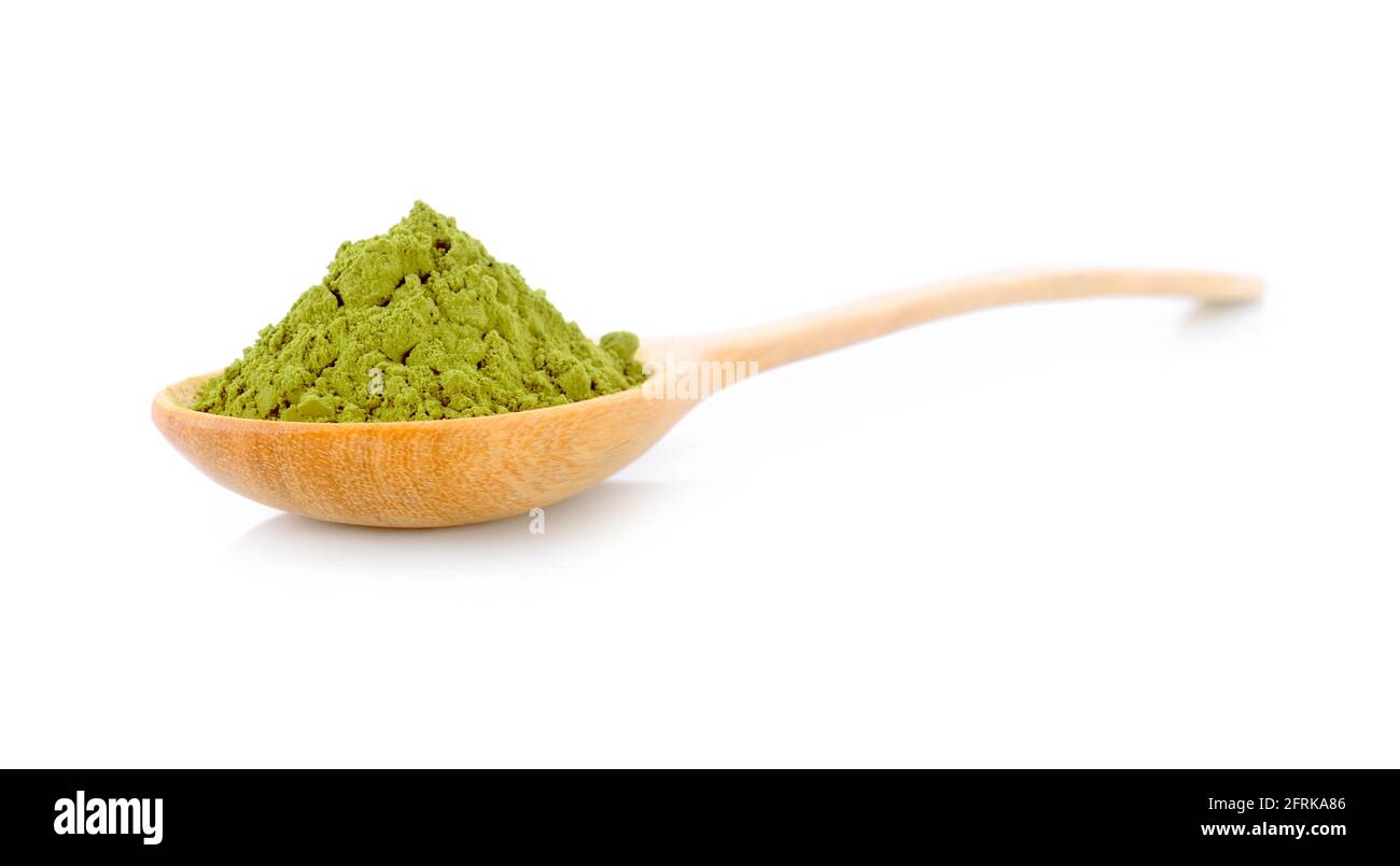 Powdered matcha green tea with spoon on white background Stock Photo ...