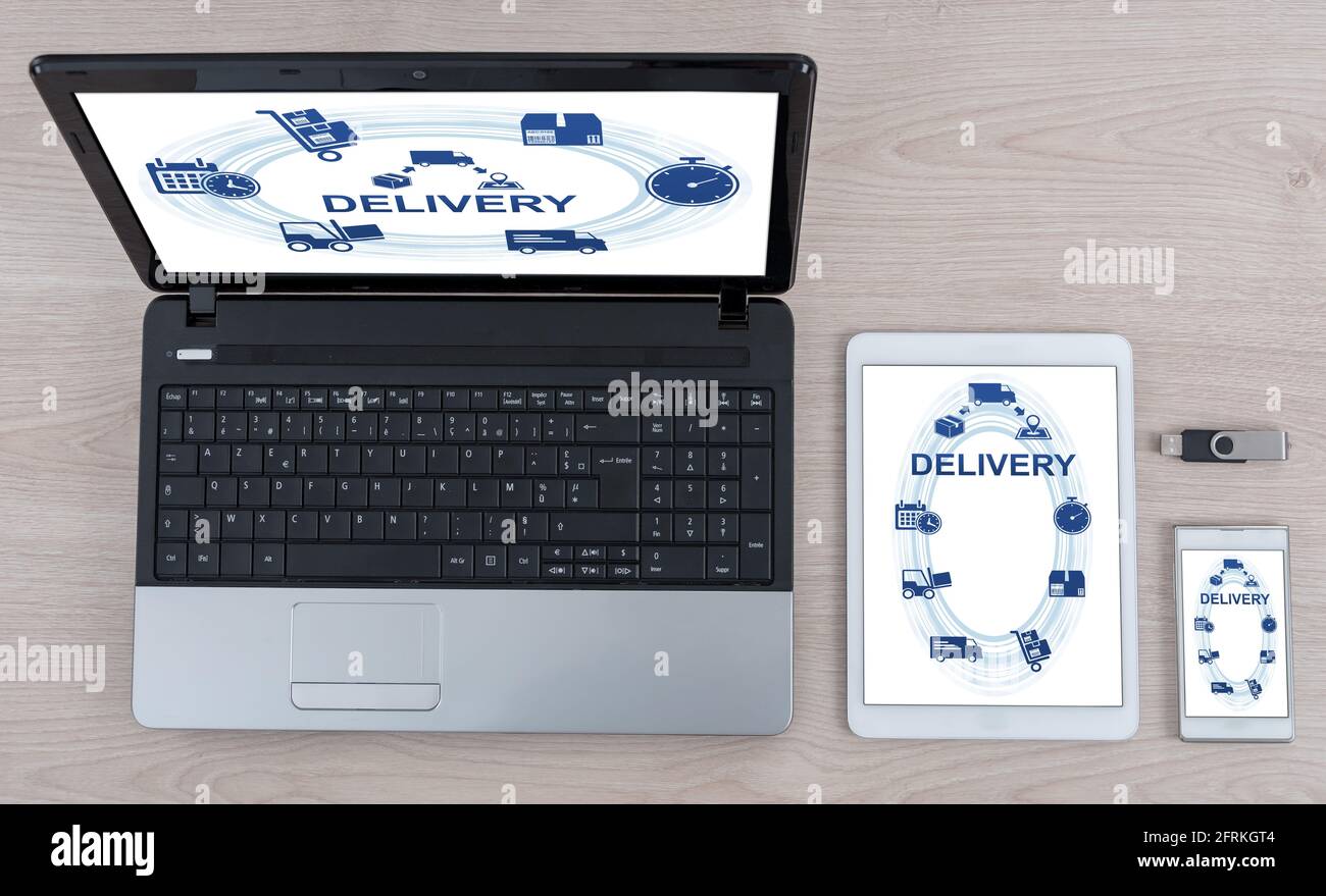 Delivery concept shown on different information technology devices ...