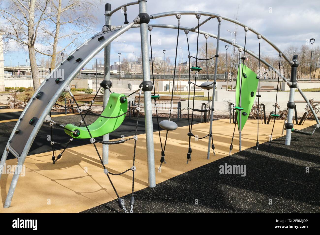 A modern playground in the city park for games and sports. Public place ...