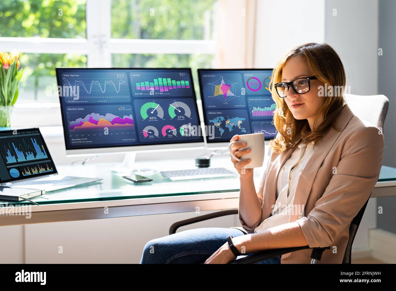 Analyst Woman Looking At Business Data Analytics Dashboard Stock Photo ...