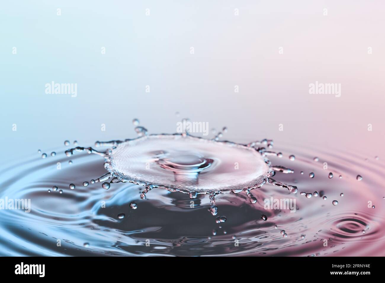 Collision ripple splash of two drops falling into the water Stock Photo ...