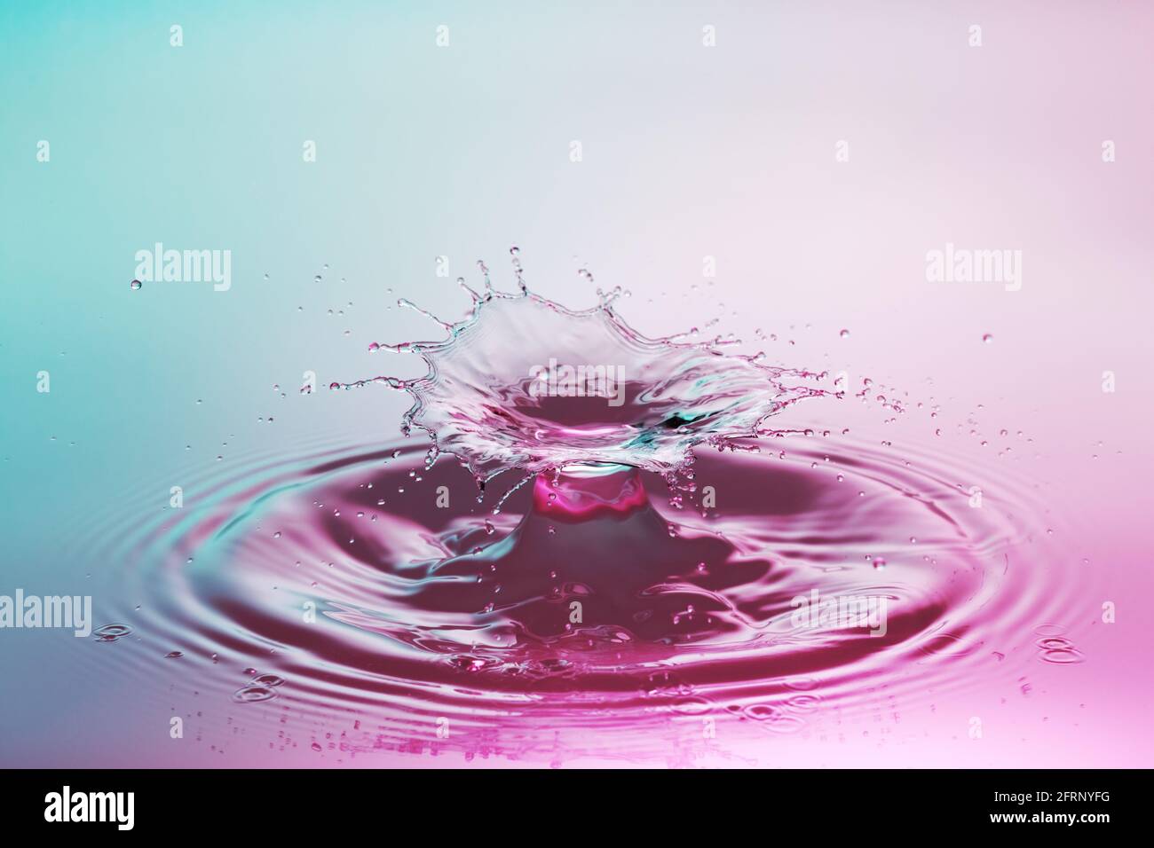Collision ripple splash of two drops falling into the water Stock Photo ...