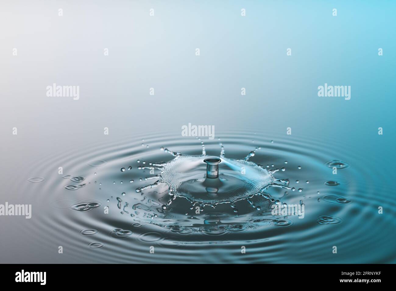 Collision ripple splash of two drops falling into the water Stock Photo ...