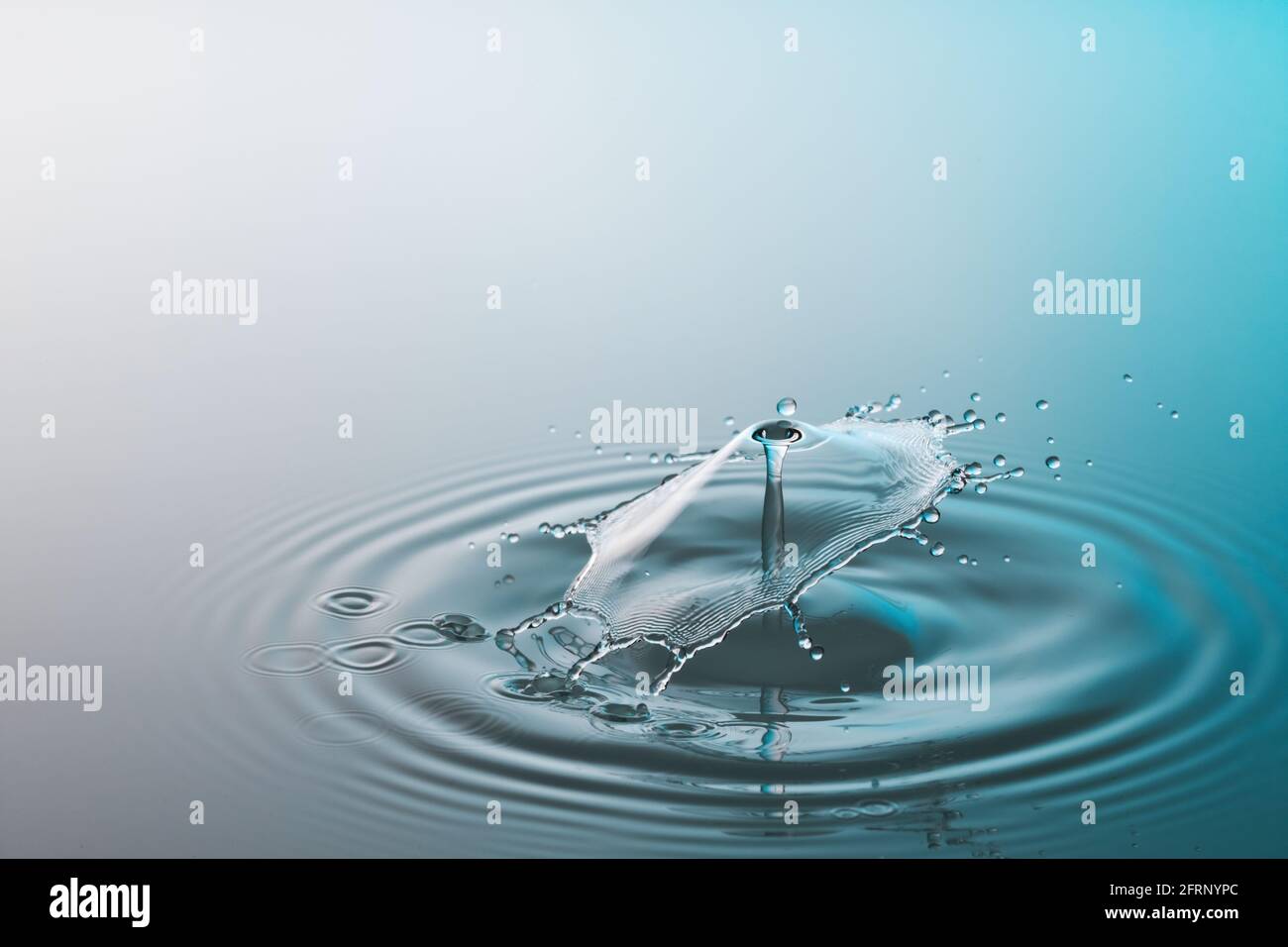 Collision ripple splash of two drops falling into the water Stock Photo ...