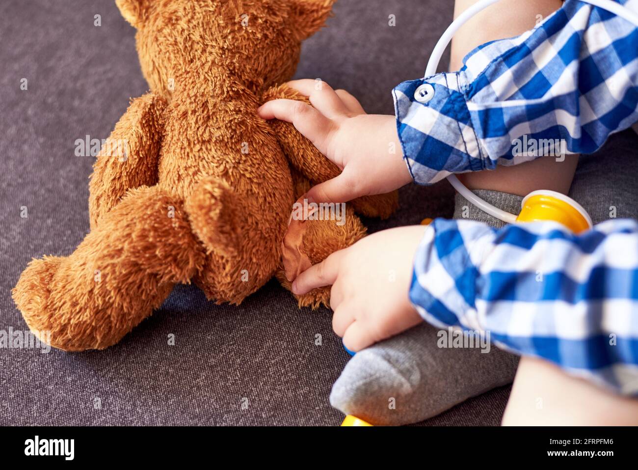 Cute little teddy bear plaster hi-res stock photography and images - Alamy