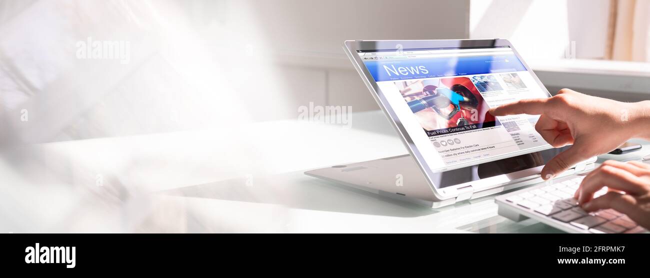 Office lady reading newspaper hi-res stock photography and images - Alamy
