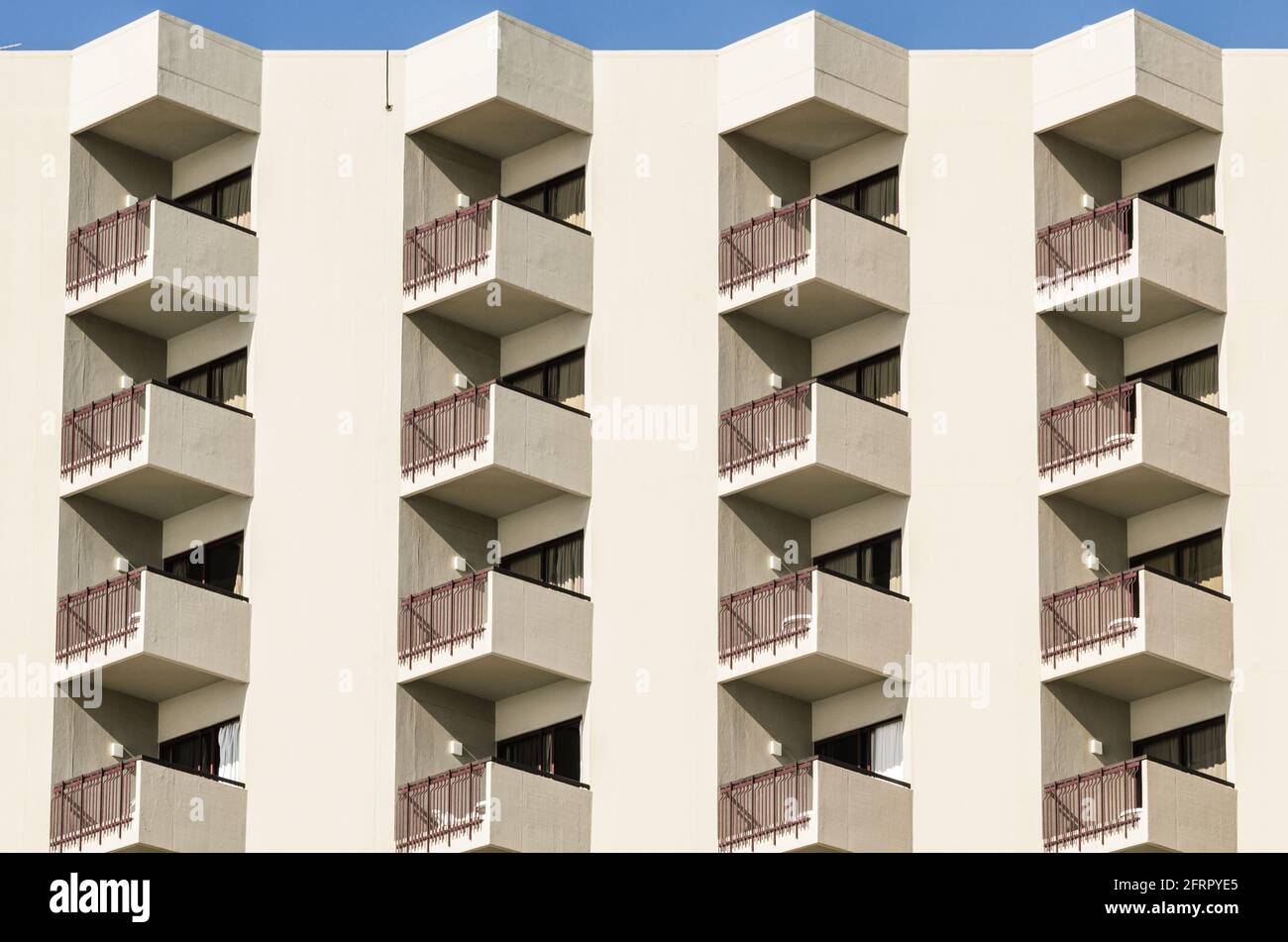 Hotel building with empty balconies Stock Photo - Alamy