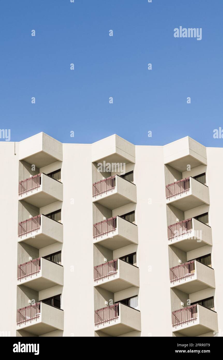 Hotel building with empty balconies Stock Photo - Alamy
