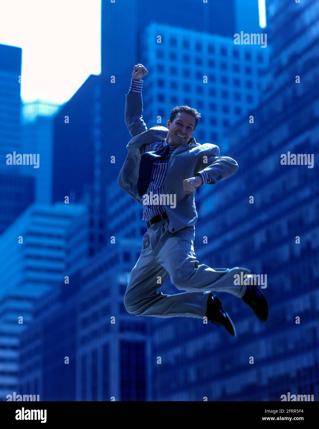 2005 HISTORICAL AIRBORNE OFFICE WORKER JUMPING IN MID AIR OFFICE ...