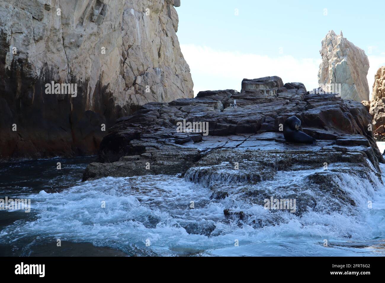 Pacific ocean dramatic limestone rock formations in Los Cabos, Cabo San ...