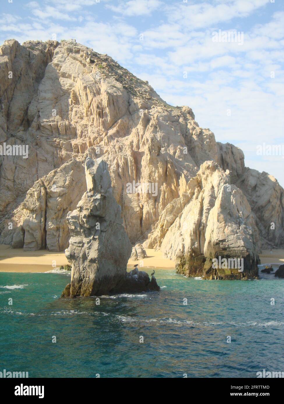 View of rugged rocks on the cape where the Pacific Ocean meets Sea of ...
