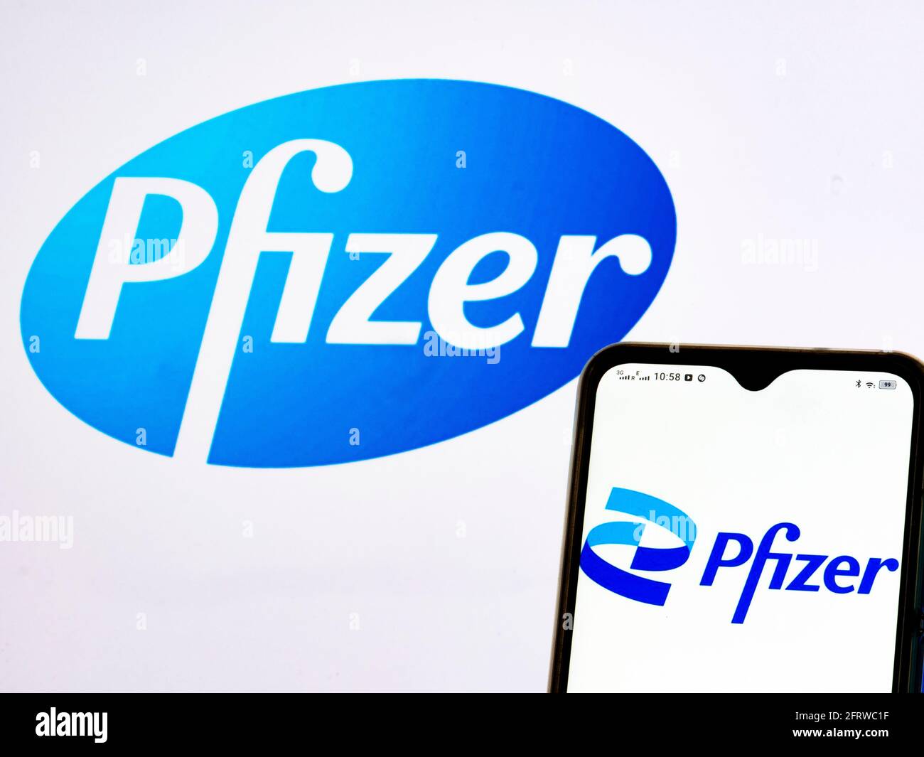 In this photo illustration Pfizer, Inc. logo seen displayed on a ...