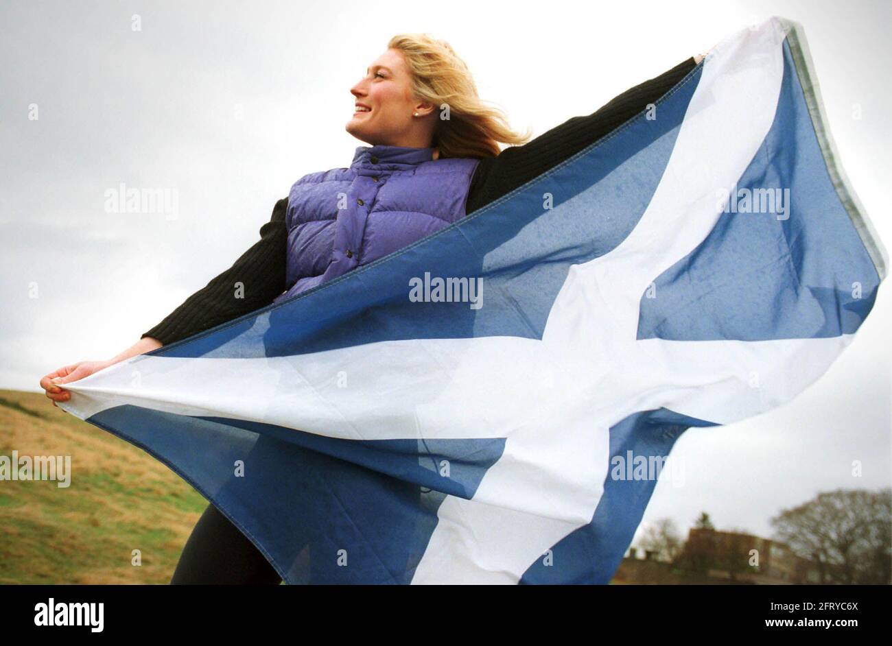 Ali Paton also known as Siren from the TV show Gladiators holds aloft ...