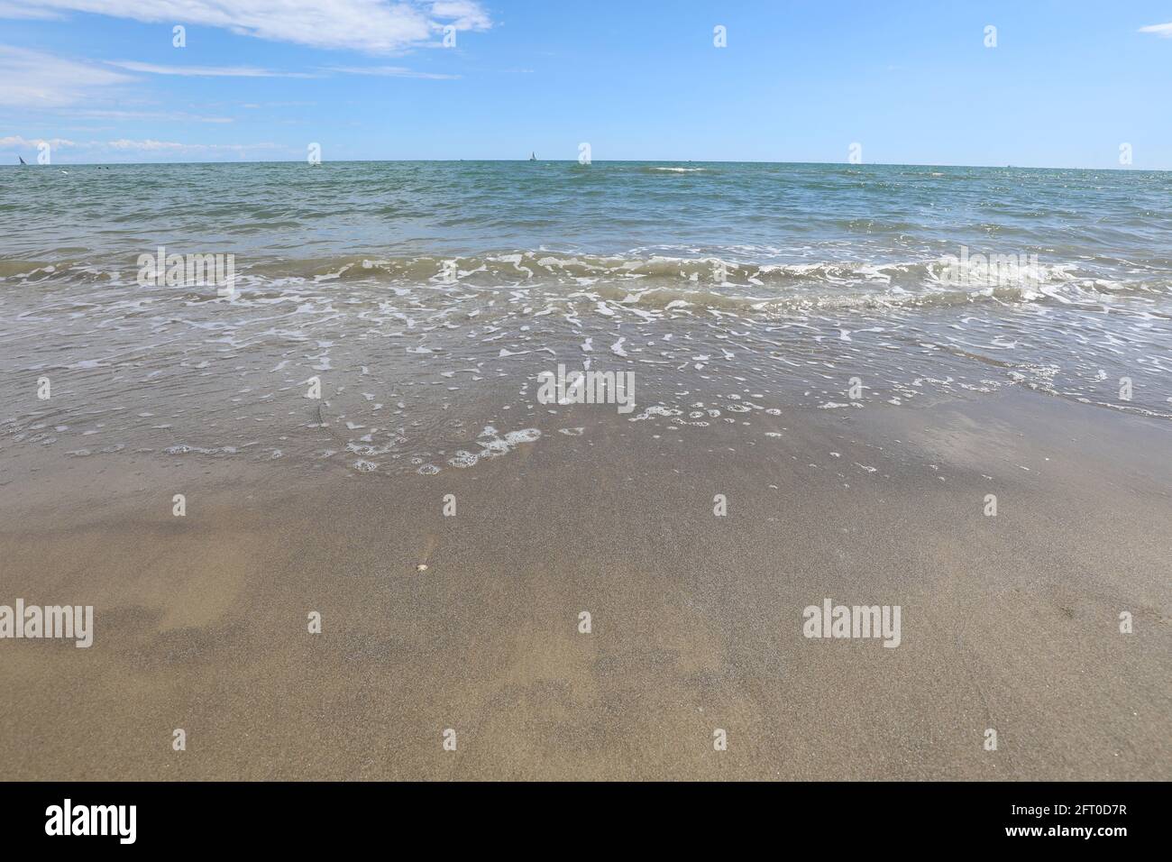 simple sea background with sandy beach ideal for use as a neutral ...
