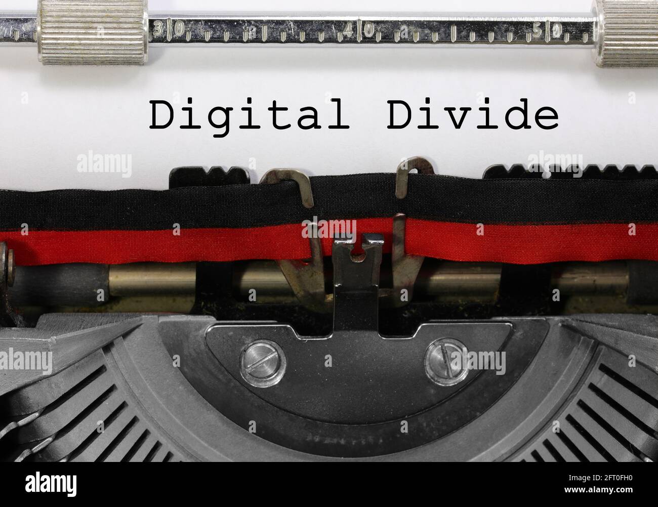 Phrase Digital Divide writen with an old vintage typewriter Stock Photo ...