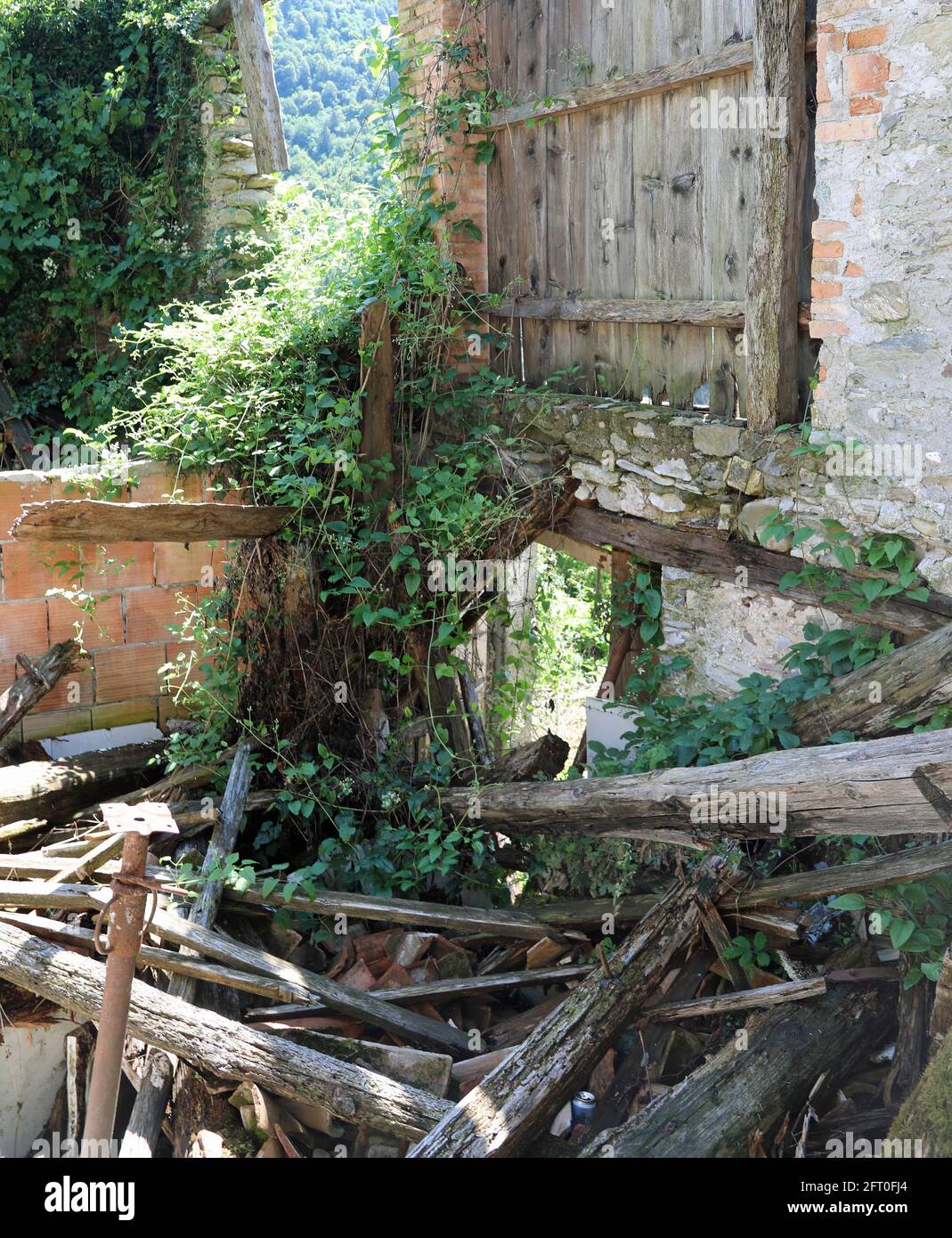 wooden planks and rubble of the house destroyed after a terrible ...