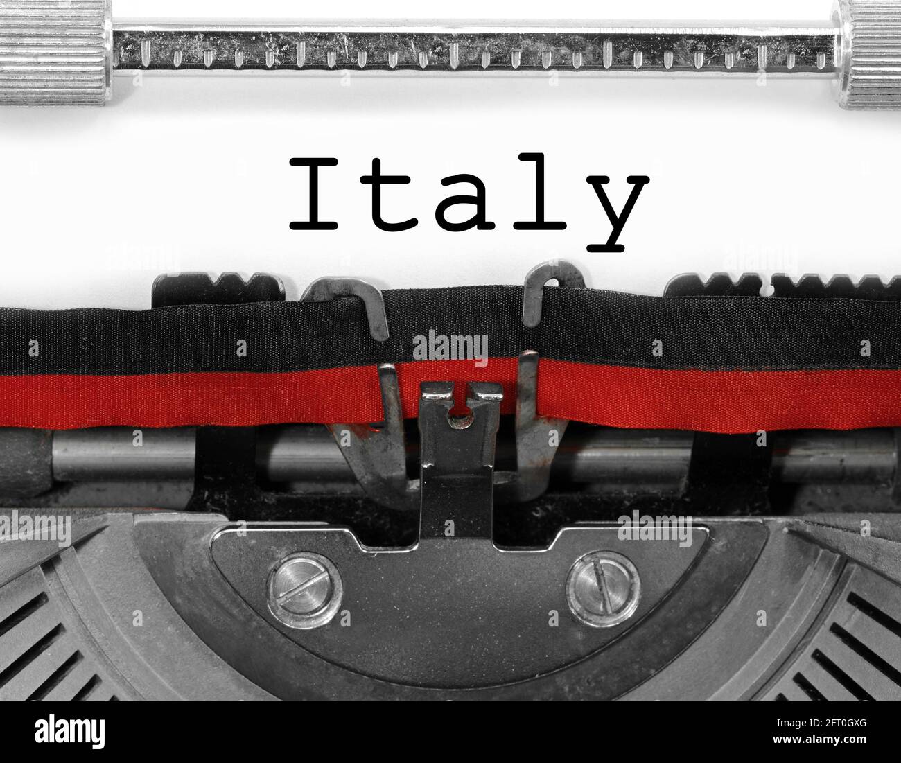 Italy writen with an old vintage typewriter on white paper with black ...