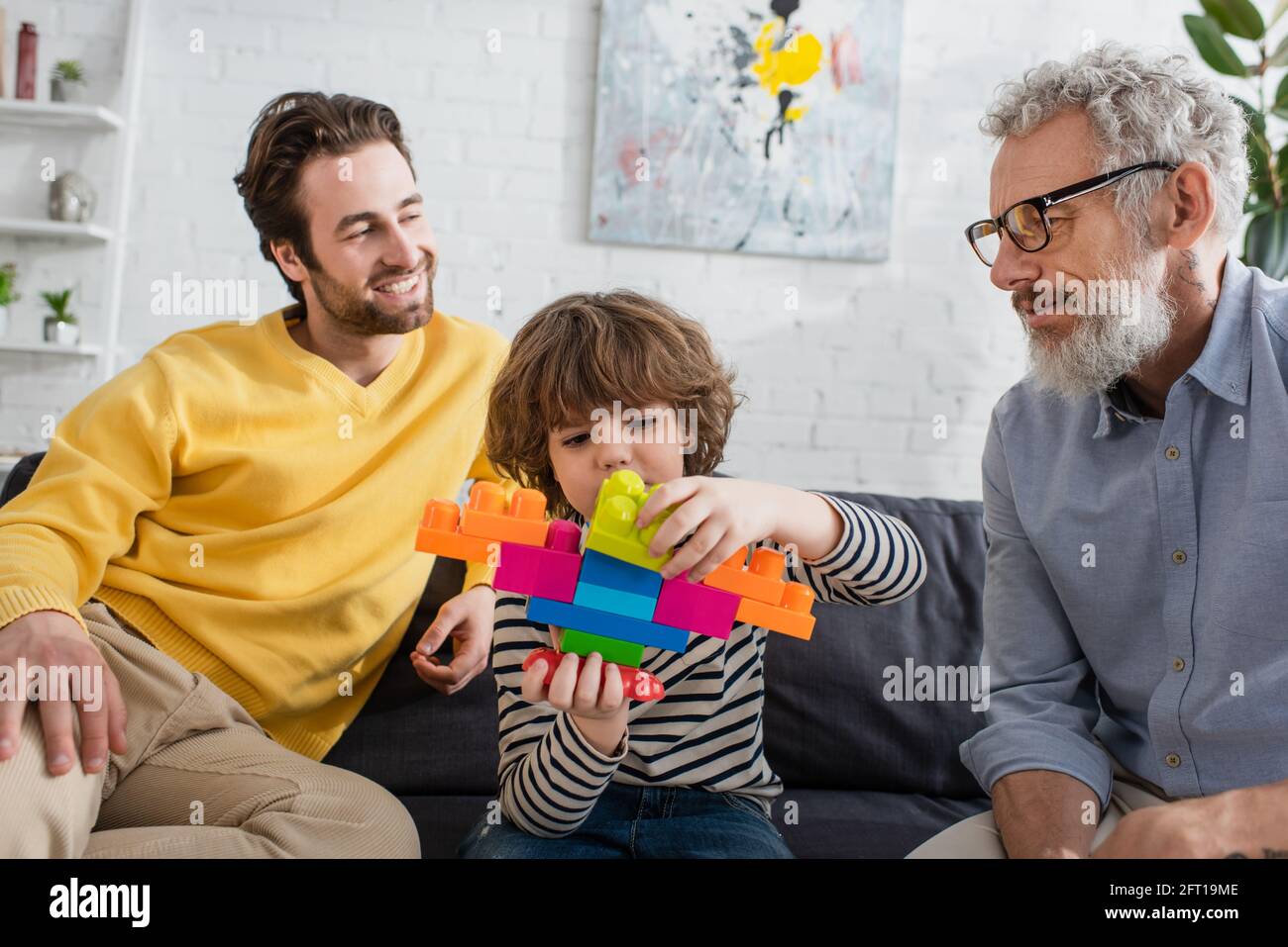 Boy grandfather blocks hi-res stock photography and images - Alamy
