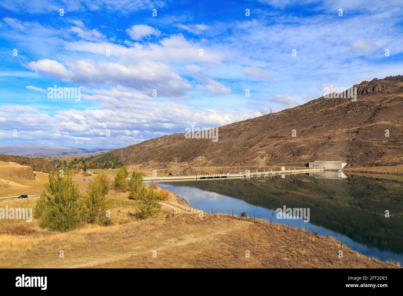 The Clyde Dam, a hydroelectric dam on the Clutha River near the town of ...