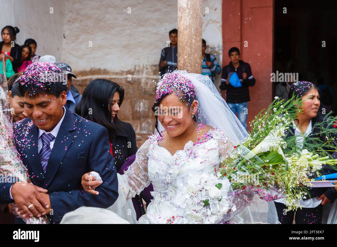 Smiling Quechua bride and groom at a traditional local wedding ...