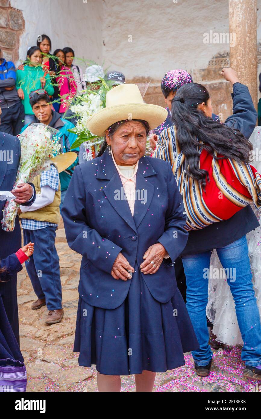 Elderly Quechua wedding guest wearing a hat at a local wedding ...