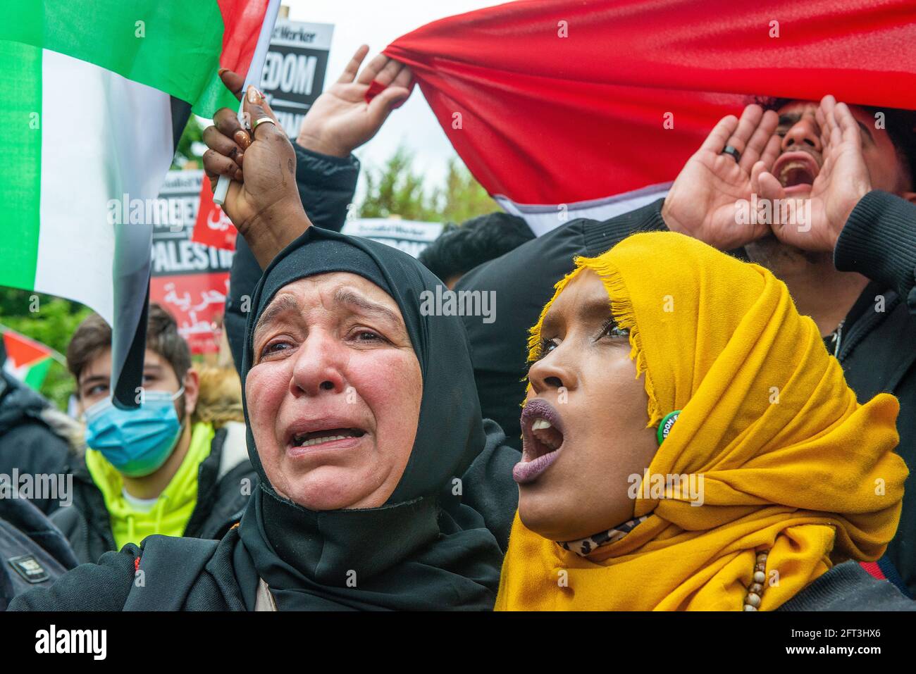 London, UK. 15th May 2021. Muslim women shouting and crying, at the ...