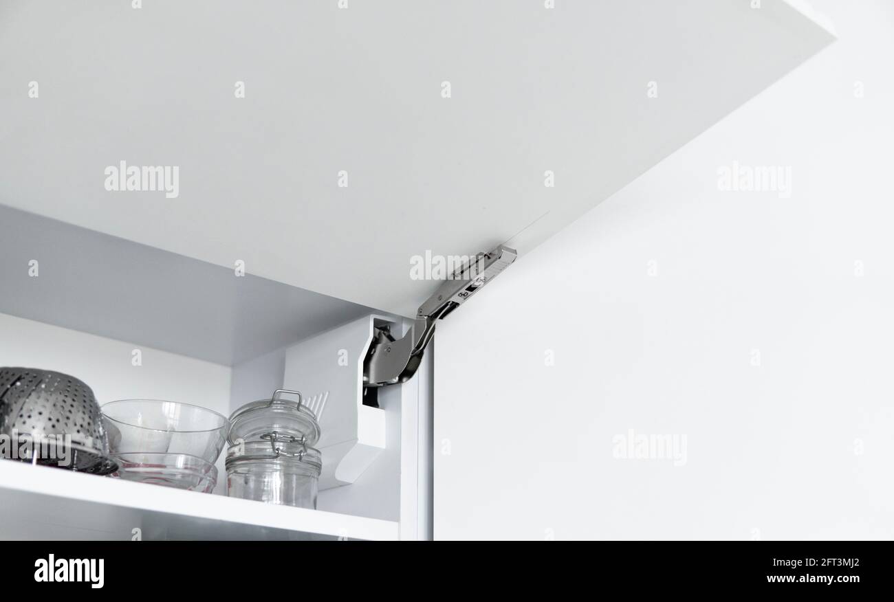 Kitchen cabinet with open fronts. Lift system for bifold fronts for ...