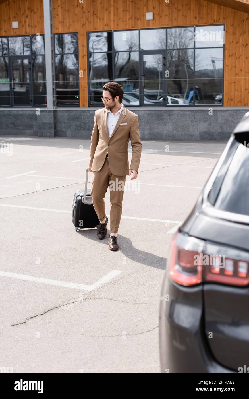 Man walking in parking near hi-res stock photography and images - Alamy