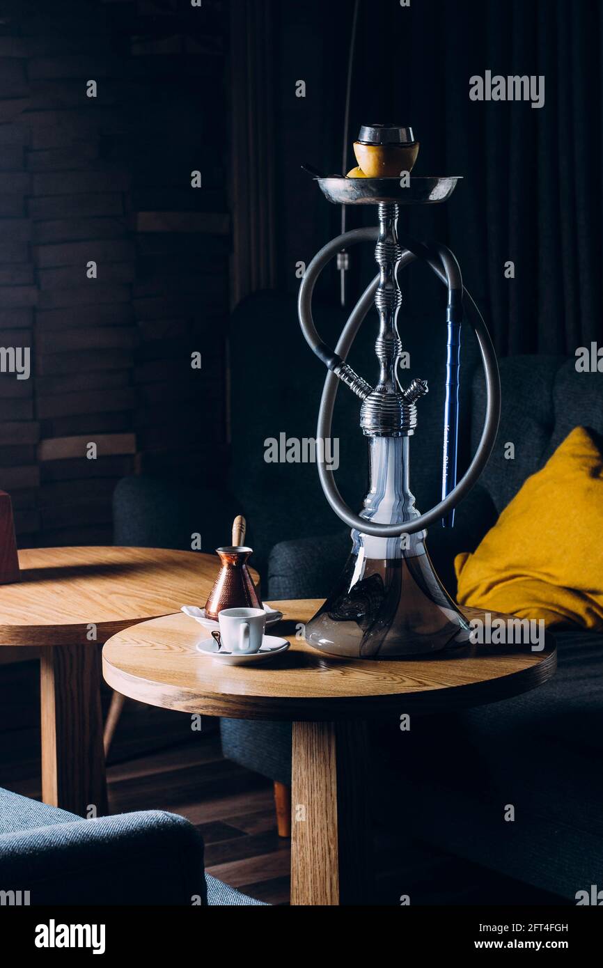 Hookah on shisha bowl with dark background. Stylish oriental shisha in ...