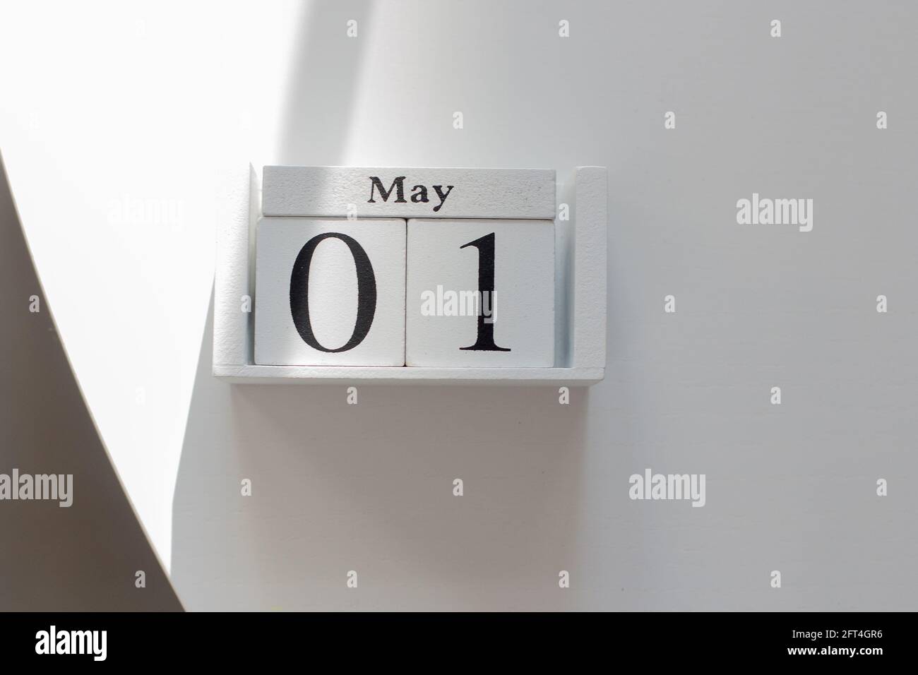 May 1st. Image of may 1 wooden calendar on white background. Spring day ...