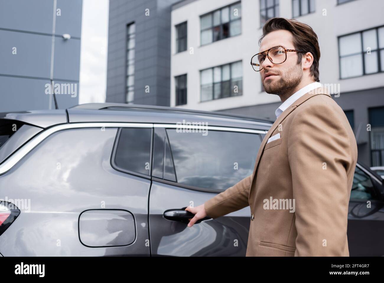 Man reaching open door hi-res stock photography and images - Alamy
