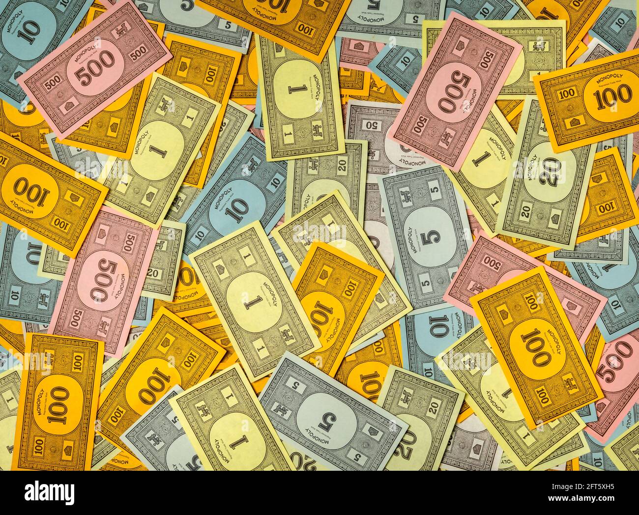 View of Monopoly Money in a pile Stock Photo - Alamy